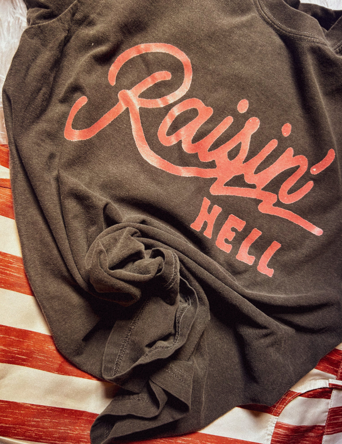 Raising Hell – Three in Bloom LLC